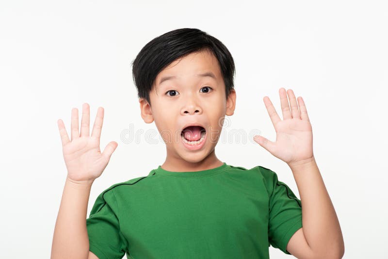 Portrait of Joyful or Surprised Cute Asian Schoolboy with Raised Hands ...