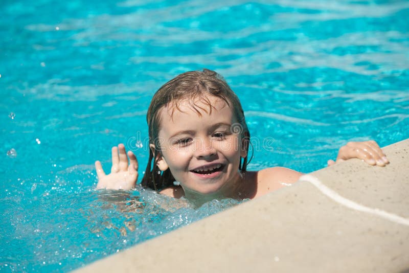 Portrait of Kid in Swimming Pool. Cute Boy in the Water Playing with ...