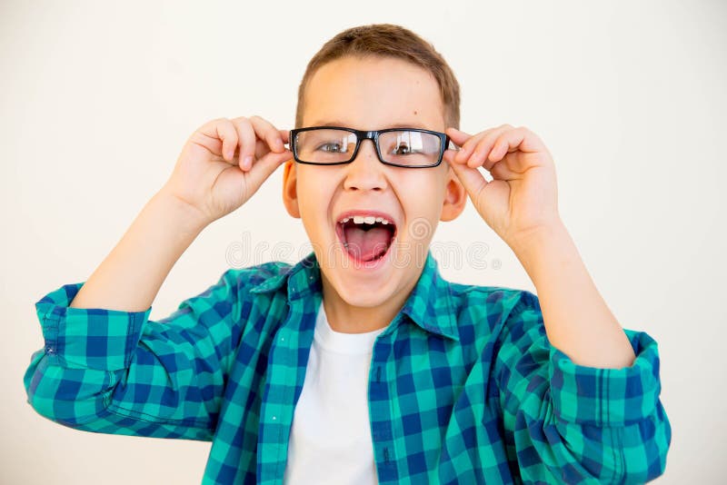 Kid wearing glasses stock image. Image of hands, caucasian - 112972597