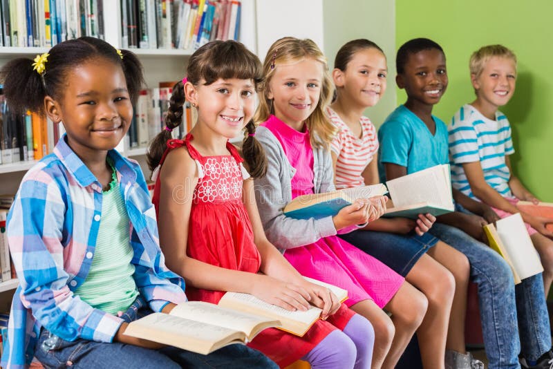 Portrait of Kids Reading Book in Library Stock Photo - Image of ...