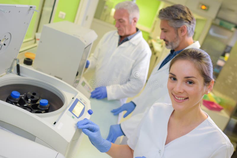 Portrait Lab Worker Next To Equipment Stock Photo - Image of tube, team ...