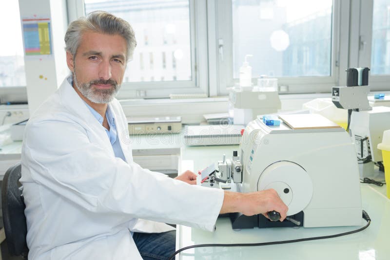 Portrait Laboratory Technician Operating Equipment Stock Image - Image ...