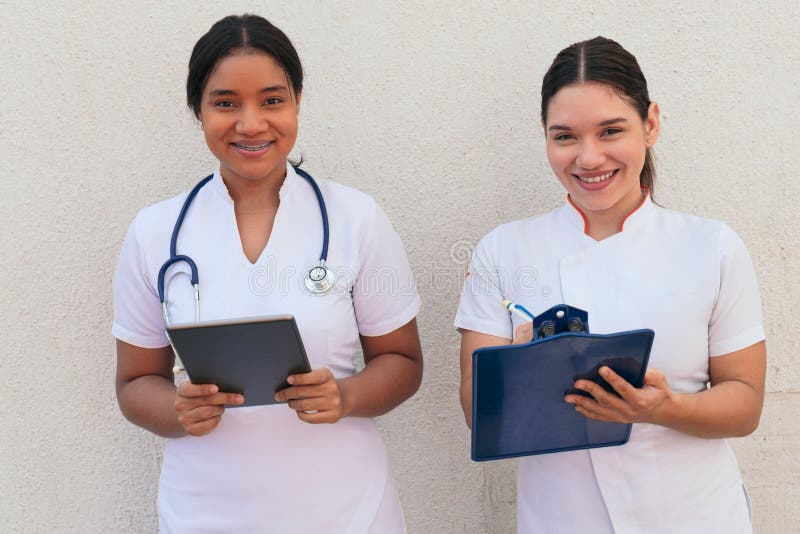 Portrait of Latina Nurses at Work in a Hospital Stock Photo - Image of ...