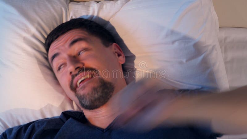 The Portrait of the Laughing Man Going To Sleep. Close-up. 4K. Stock ...