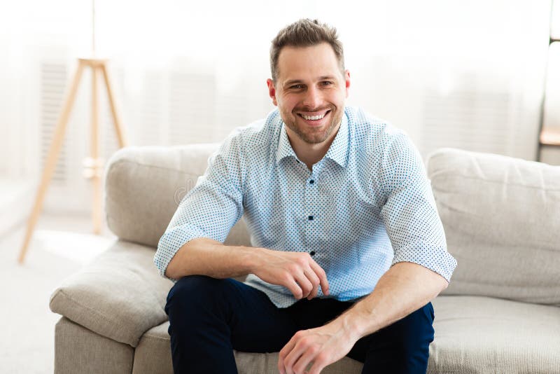 Happy Man Having Rest at Home on the Sofa Stock Photo - Image of break ...