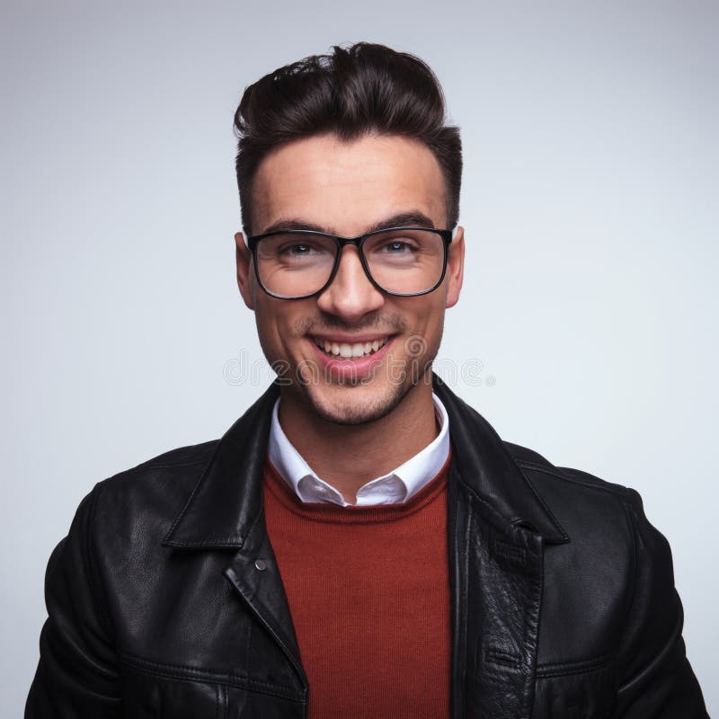 Portrait of a Laughing Young Man Wearing Glasses Stock Photo - Image of ...