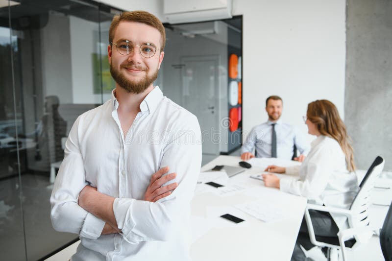 Portrait of a Leader with Business Team Behind. Stock Photo - Image of ...