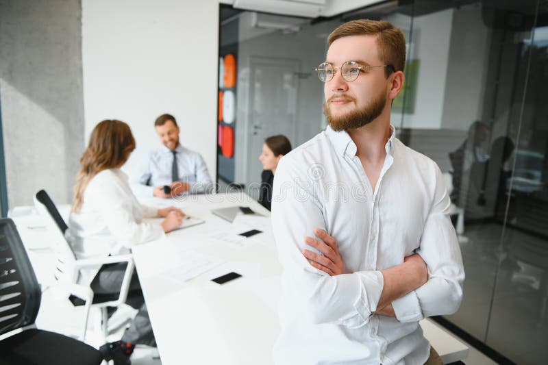 Portrait of a Leader with Business Team Behind. Stock Photo - Image of ...