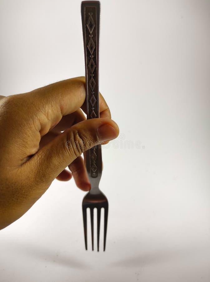 Holding a Stainless Fork on White Stock Photo - Image of female ...