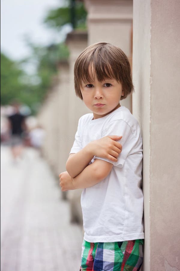 Angry Little Toddler Child, Blond Boy, Sitting in Corner with Teddy ...