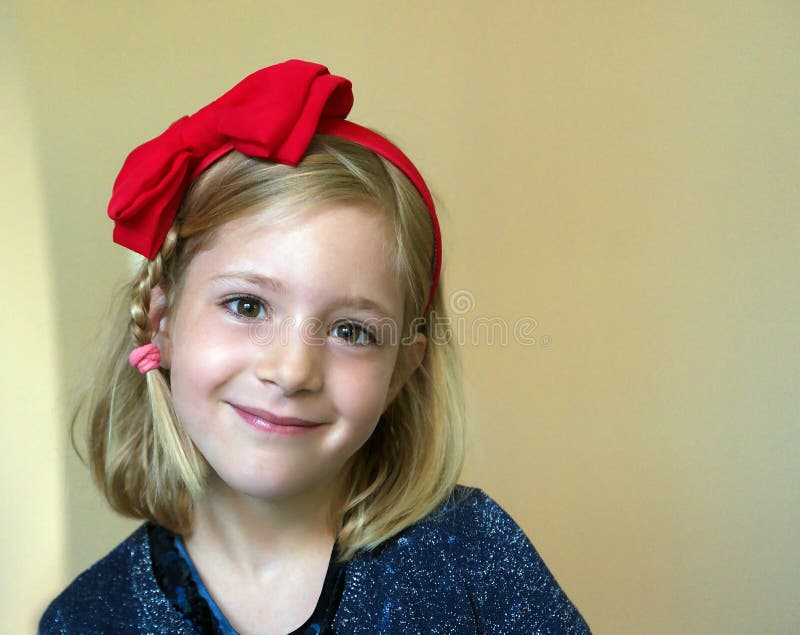 Portrait of a Little Blonde Girl with a Red Bow on His Head Stock Image ... Portrait of a Little Blonde Girl with a Red Bow on His Head Stock Image ...