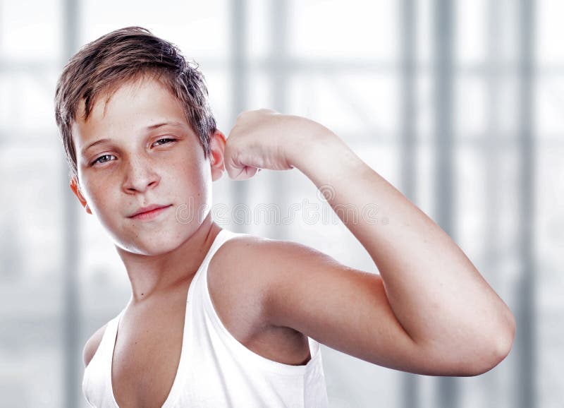 Portrait of Little Boy Flexing Biceps Stock Photo - Image of human, cute: 47348596
