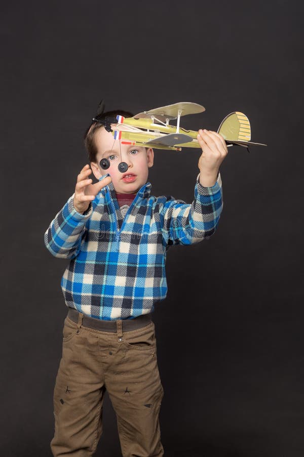 Boy Playing with a Model Airplane Stock Photo - Image of caucasian ...