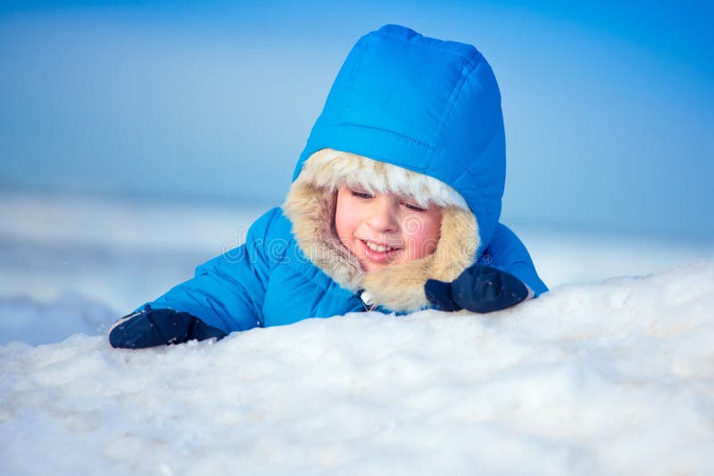 Portrait of a Little Boy Playing in the Snow Stock Image - Image of ...