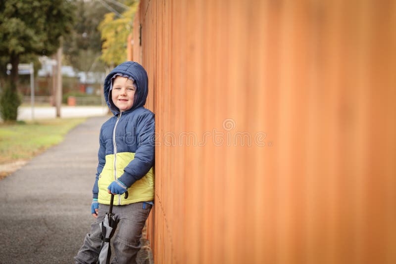 Portrait of a Little Boy in a Pretty Garden Setting Stock Photo - Image ...