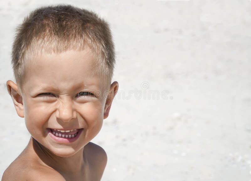 Portrait of Little Boy Smiling on the Background of the Sea Beach ...