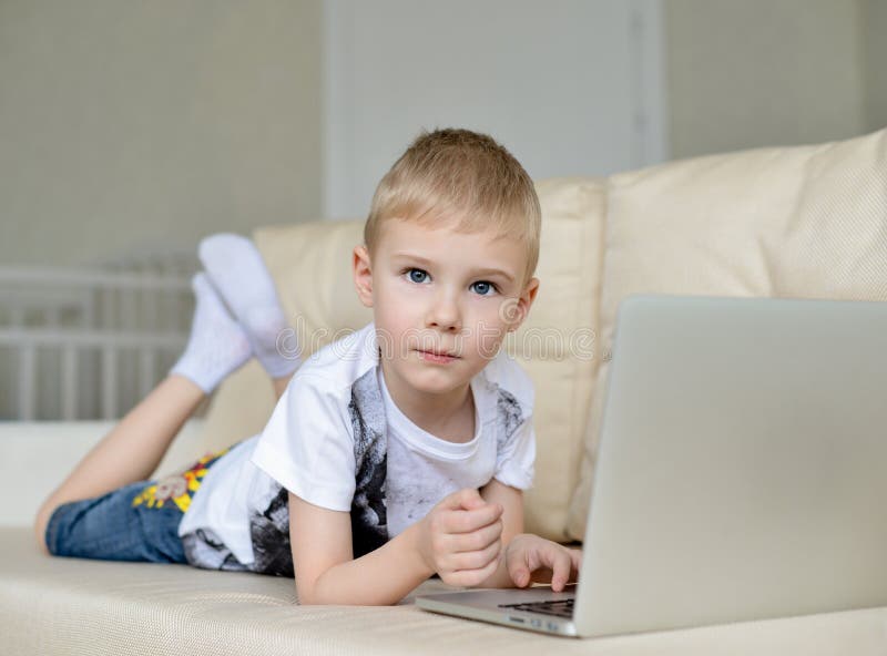 Portrait Little Boy Stretched Out Sofa Front Laptop Computer Stock ...