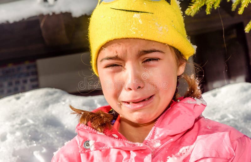 Portrait of a Little Girl Crying because she is Cold in the Snow Stock ...