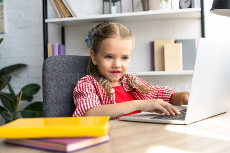 Portrait of Little Kid Using Laptop at Table Stock Image - Image of ...
