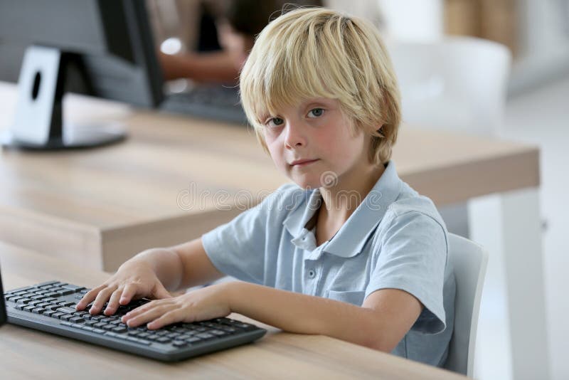 Portrait of Little Pupil Boy on Computer Stock Image - Image of ...