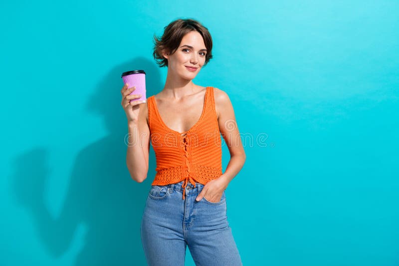Portrait Of Lovely Adorable Girl With Bob Hairstyle Wear Orange Knit
