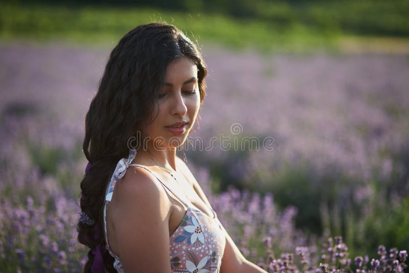 Young Slim Fair Skinned Girl Brunette Beautiful Lies In Lavender Field