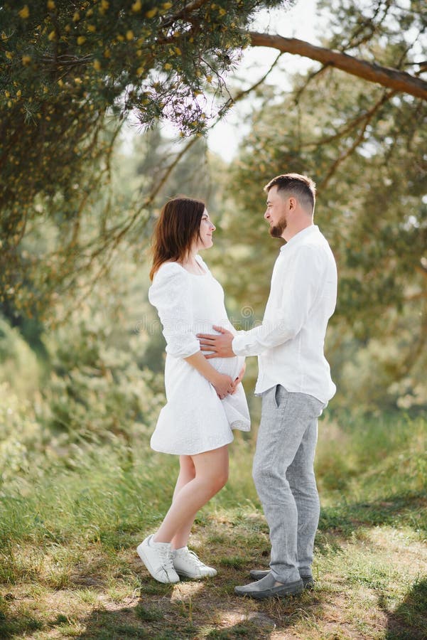 Portrait of Lovely Future Parents during Sunset Stock Photo - Image of ...