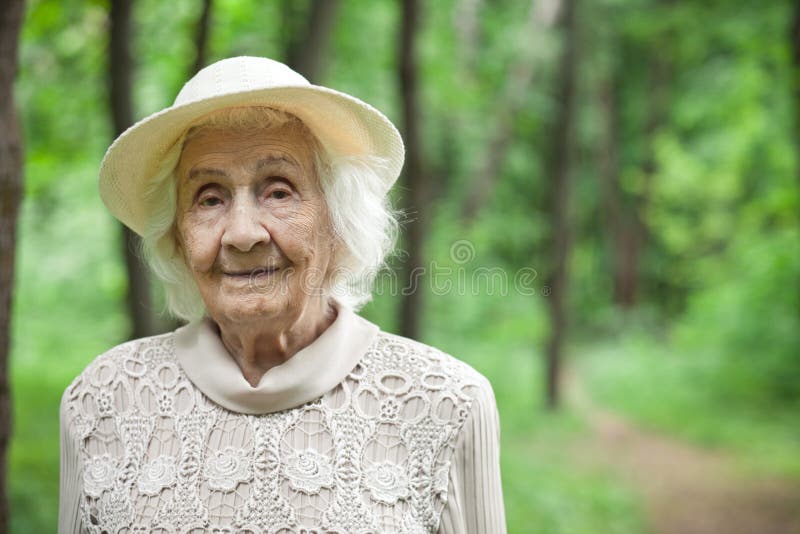 Portrait of a Lovely Old Woman Smiling Outdoors Stock Photo - Image of ... Portrait of a Lovely Old Woman Smiling Outdoors Stock Photo - Image of ...