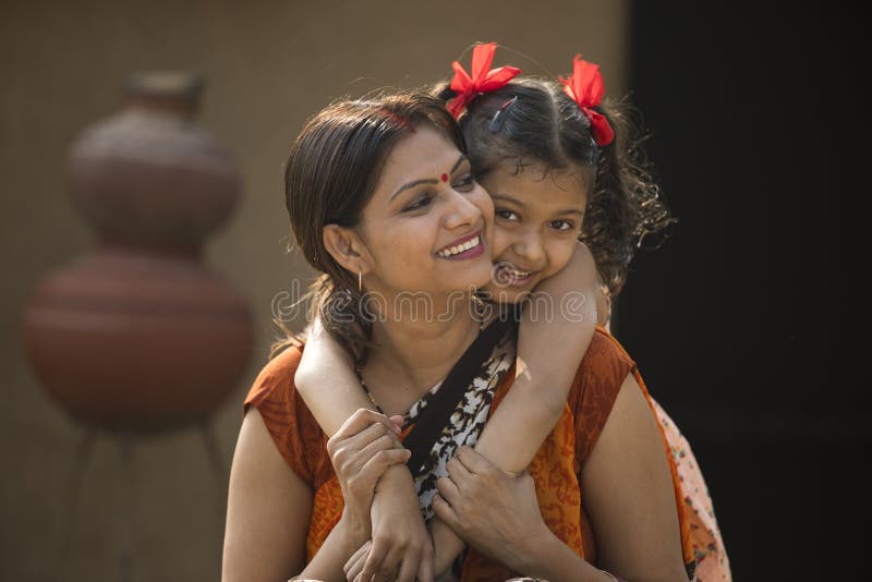 Portrait Of Loving Indian Mother And Daughter At Village Stock Image