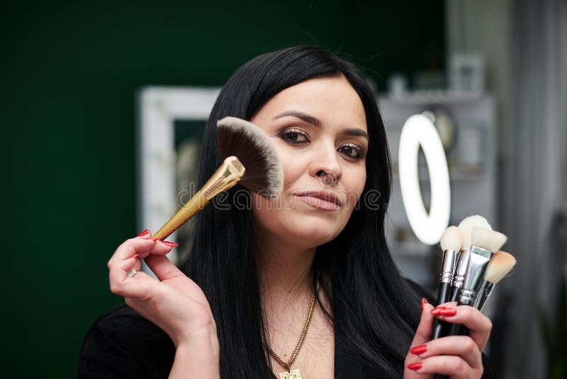 Portrait of Make-up Artist at Workplace in Beauty Studio, Holding ...