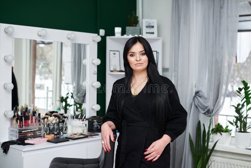 Portrait of Make-up Artist at Workplace in Beauty Studio. Work Process ...