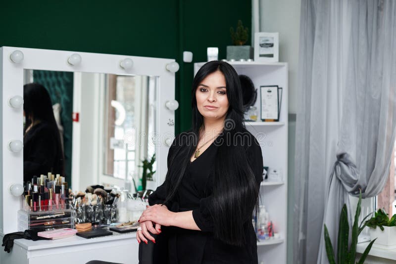 Portrait of Make-up Artist at Workplace in Beauty Studio. Work Process ...