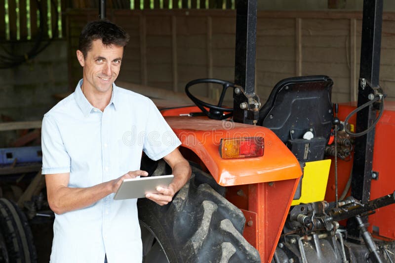 Portrait of Male Agricultural Worker Using Digital Tablet Stock Photo ...