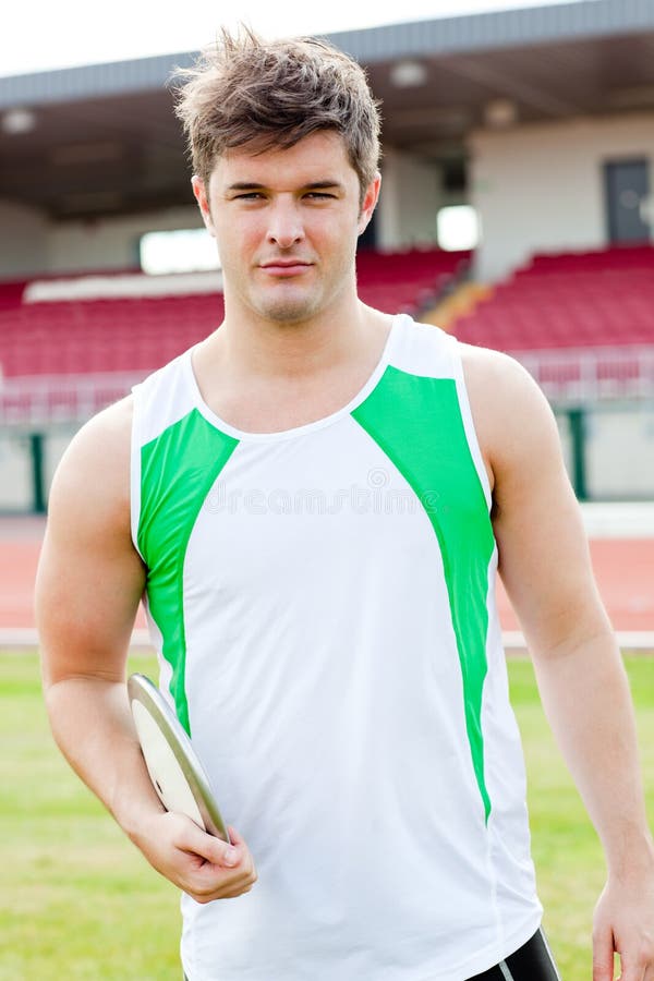 Portrait of a Male Athlete Holding a Discus Stock Photo - Image of ...