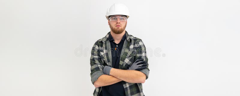 Portrait of a Male Builder. Engineer in Overalls and Helmet on a Light ...