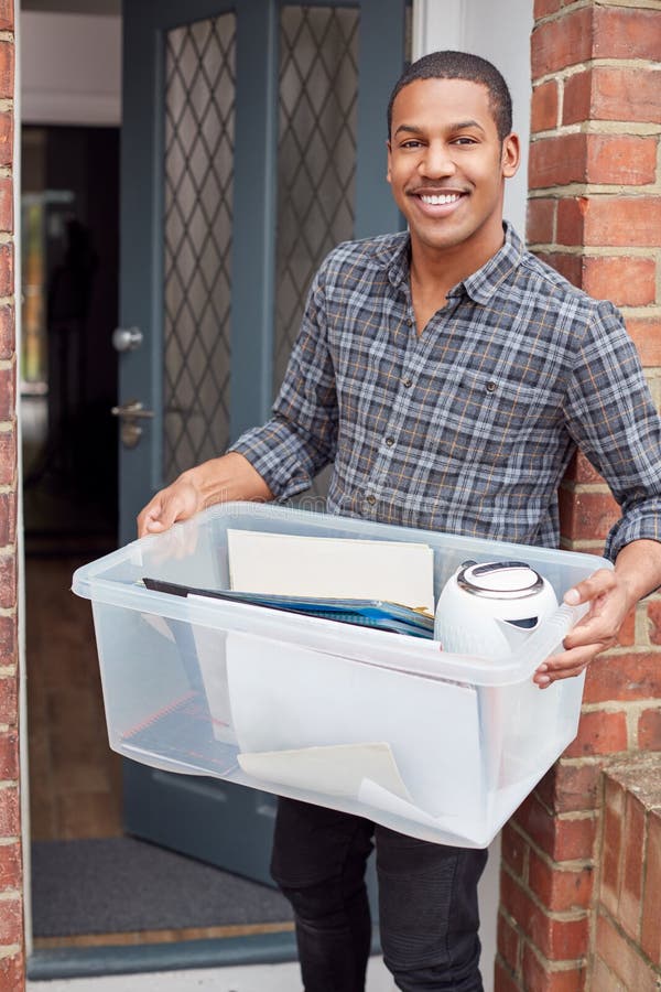 Portrait of Male College Student Carrying Box Moving into Accommodation ...