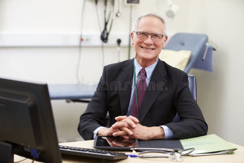 Portrait of Male Consultant Working at Desk Stock Image - Image of ...