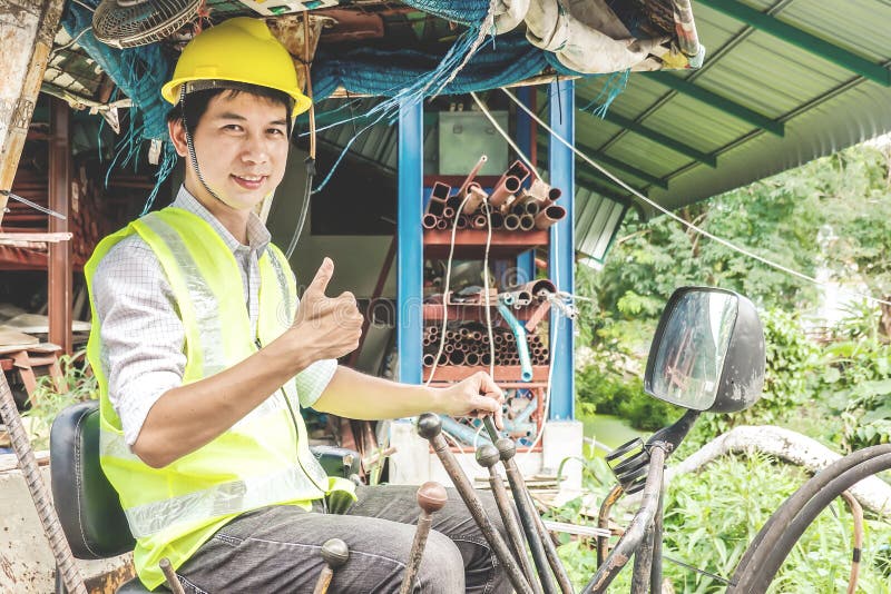 Portrait of a Male Developer Sitting Operator Driving Excavator at ...