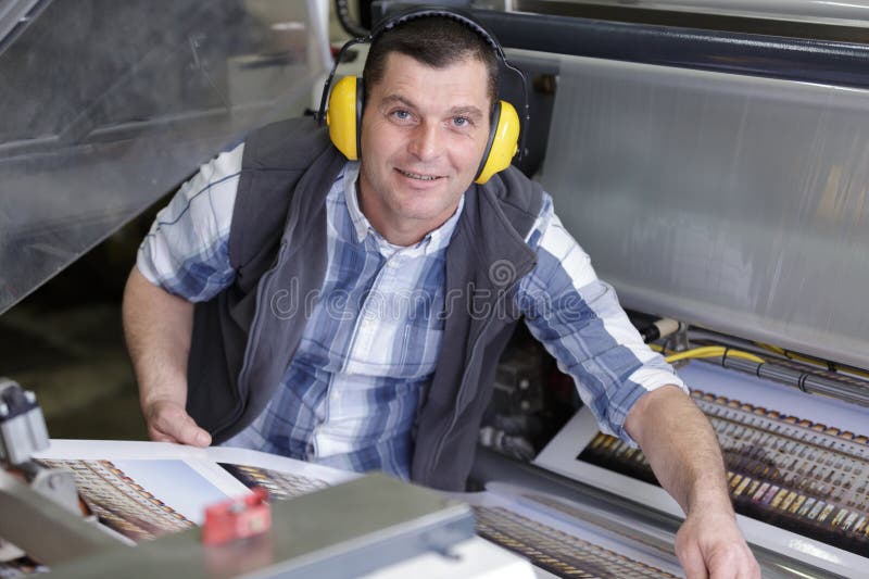 Portrait Male Engineer Working on Machine in Factory Stock Photo ...