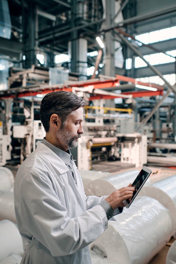 Worker Using Tablet at the Factory Stock Image - Image of plastic ...