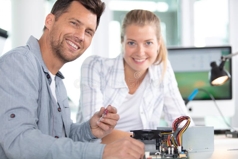 Portrait Male and Female Computer Technicians Stock Photo - Image of ...