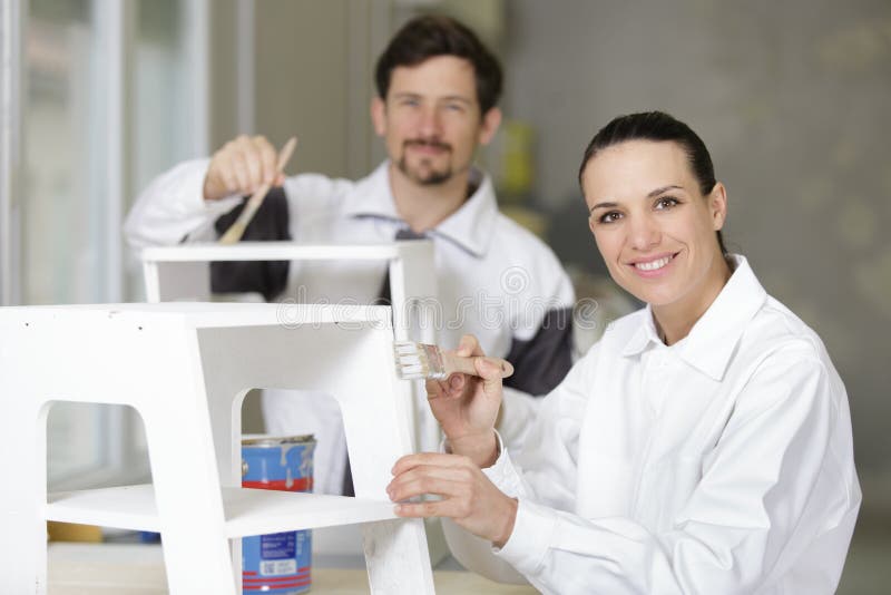 Portrait Male and Female Decorating Team Stock Photo - Image of adult ...