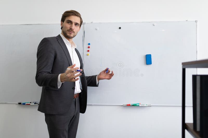 Portrait of a Male Financial Worker Explaining the Situation of the ...