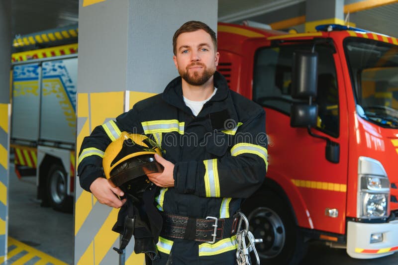 Portrait of Male Firefighter in Uniform at Fire Station Stock Photo ...