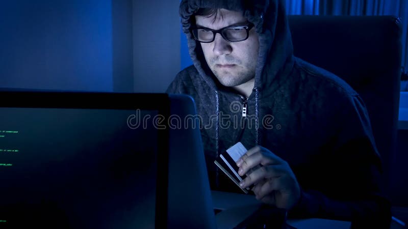 Portrait of Young Male Hacker Writing Program Code for Stealing Money ...
