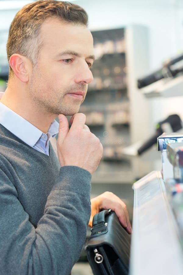 Portrait Male Hardware Store Worker Stock Photo - Image of write ...