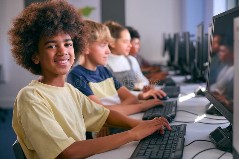 Portrait of Male Secondary or High School Student Sitting at Computer ...
