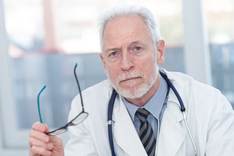 Portrait of Male Senior Doctor Stock Photo - Image of caucasian, office ...