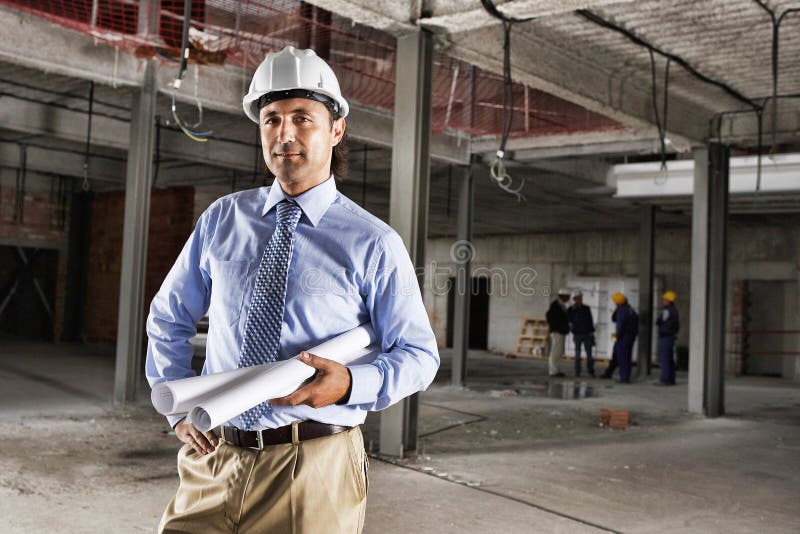 Portrait of a Male Site Manager with Blueprint at Site Stock Image ...