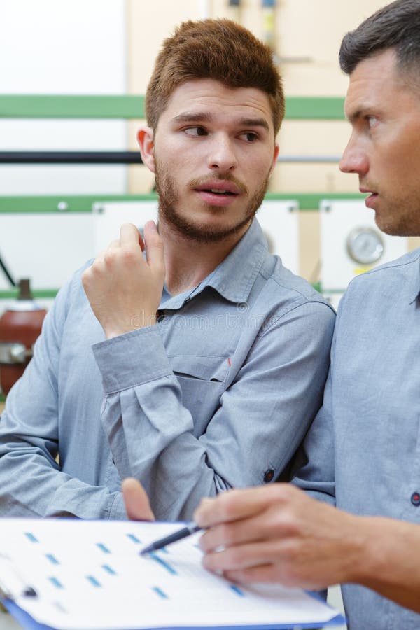 Portrait Male Teacher and Apprentice with Clipboard Stock Photo - Image ...